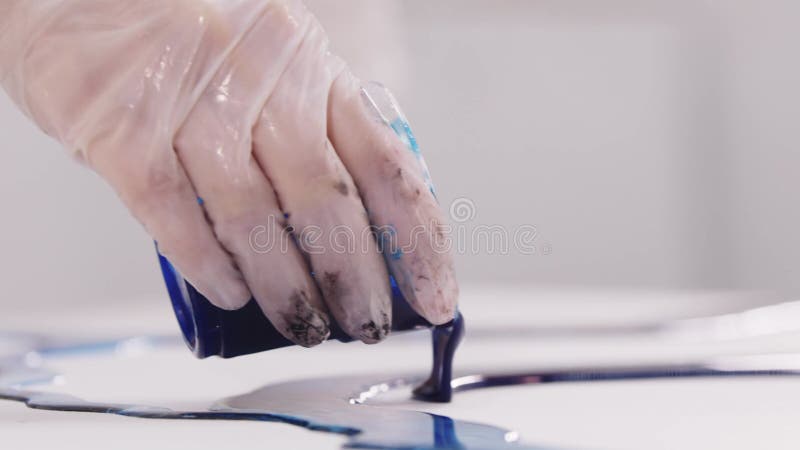 Artist Pours Deep Blue Epoxy Resin on Canvas Stock Footage - Video of ...