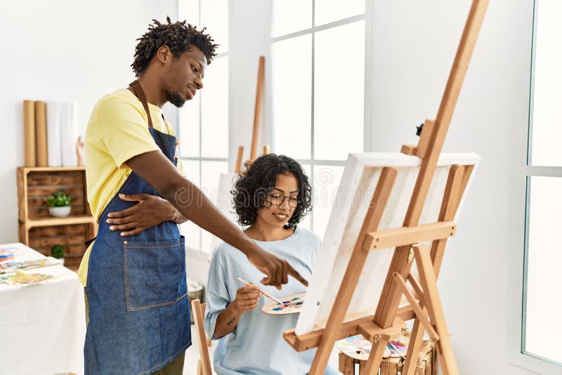 Artist Teacher and Student Painting at Art Studio Stock Image - Image ...