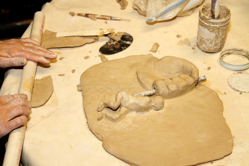 Artist working with clay stock image. Image of sculpt - 17095187