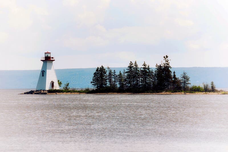 Artistic, Atmospheric Shot of Lighthouse and Row of Trees Stock Image ...