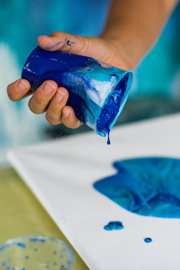 Artistic Blue Paint Pouring on Canvas Stock Image - Image of abstract ...