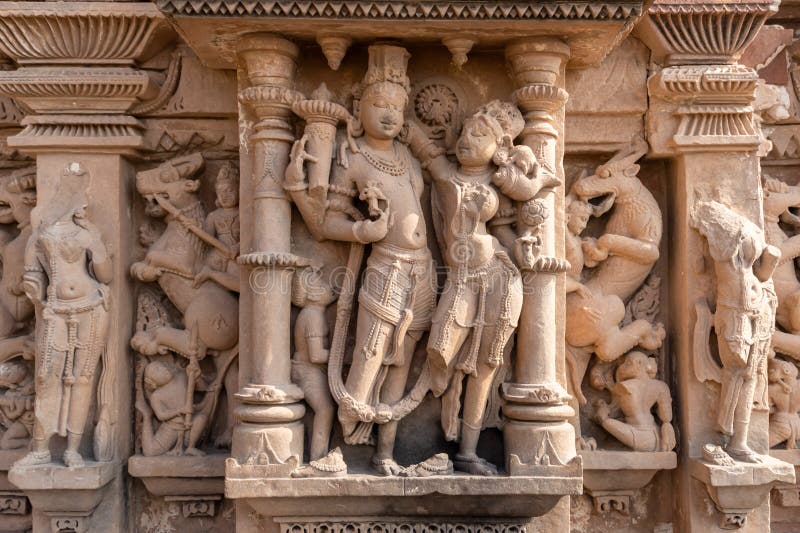 Artistic Carvings of Hindu Deities on Ancient Temple Wall in Daylight ...