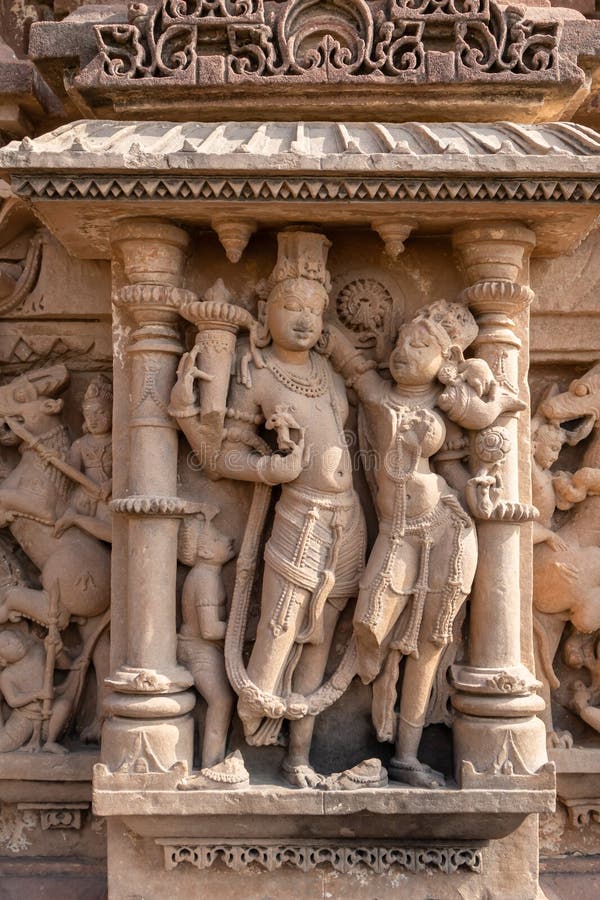 Artistic Carvings of Hindu Deities on Ancient Temple Wall in Daylight ...
