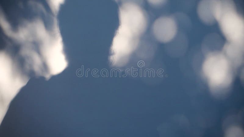 Artistic Concept: a Man S Shadow on a White Wall Forms a Buddha Statue ...