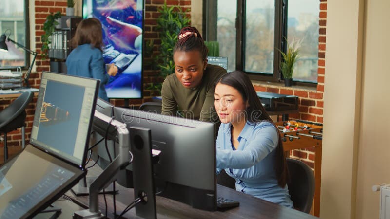 Artistic Creators Analyzing Graphics Industry Software on Computer ...