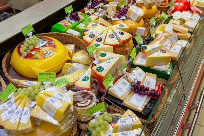 A Large Selection of Cheeses with Different Types, Textures and Flavors ...