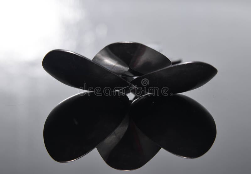 Artistic Flower Form Made with Spoons Isolated on Grey Background Stock ...