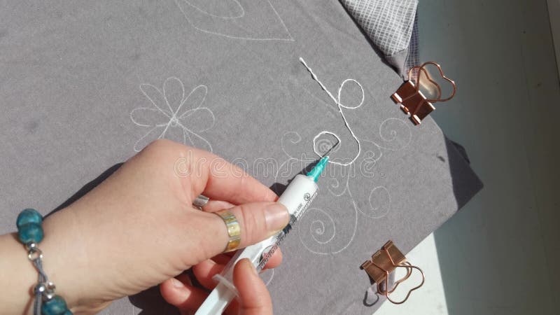 Artistic Hand Drawing Floral Patterns with Pen on Fabric Creative ...