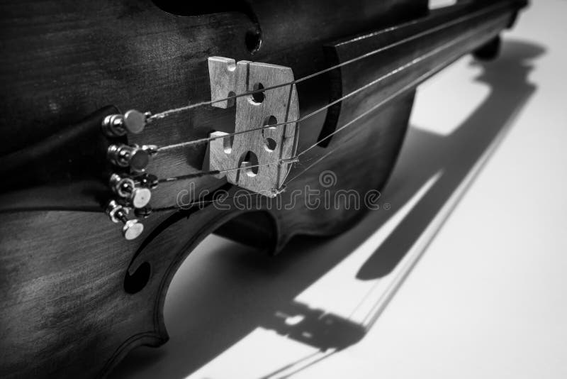 A Violin and its Shadow stock image. Image of table, strings - 59904275