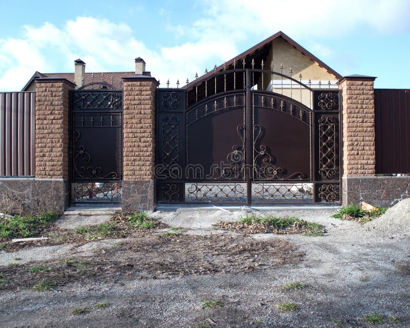 Artistic iron gates stock photo. Image of figure, building - 64190176