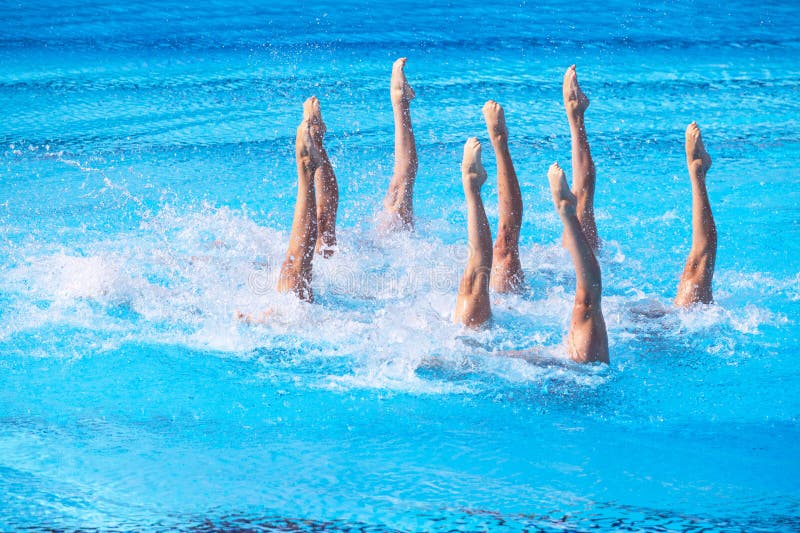 Artistic Swimming Team Performing Synchronized Legs Choreographed ...