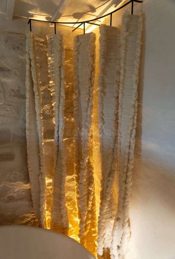 Artistic Textile Installation with Warm Lighting Stock Photo - Image of ...