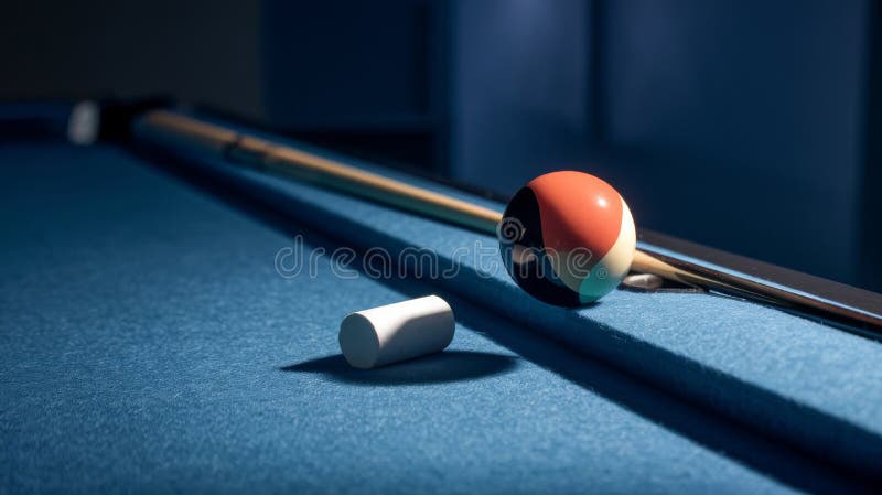 Artistic View of a Pool Ball with a Cue Stick and Chalk on a Felt Table ...