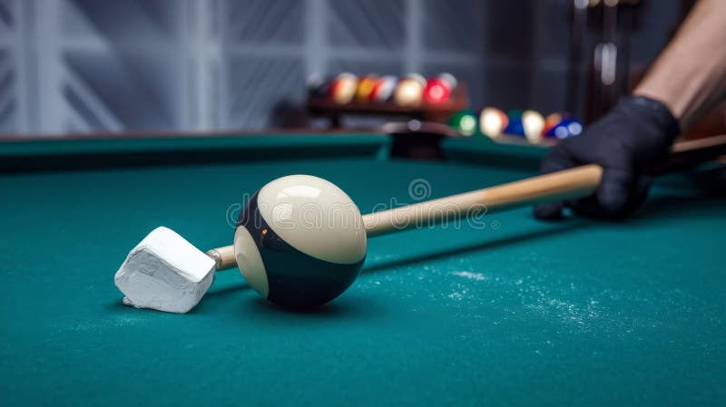 Artistic View of a Pool Ball with a Cue Stick and Chalk on a Felt Table ...