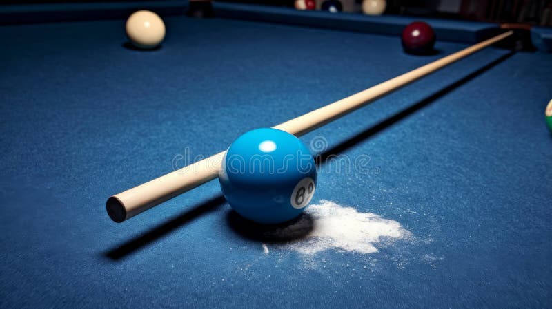 Artistic View of a Pool Ball with a Cue Stick and Chalk on a Felt Table ...