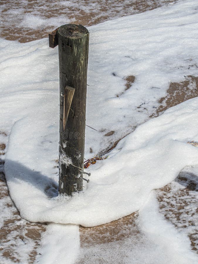 Splintered Piling in the Surf after the Hurricane Stock Image - Image ...
