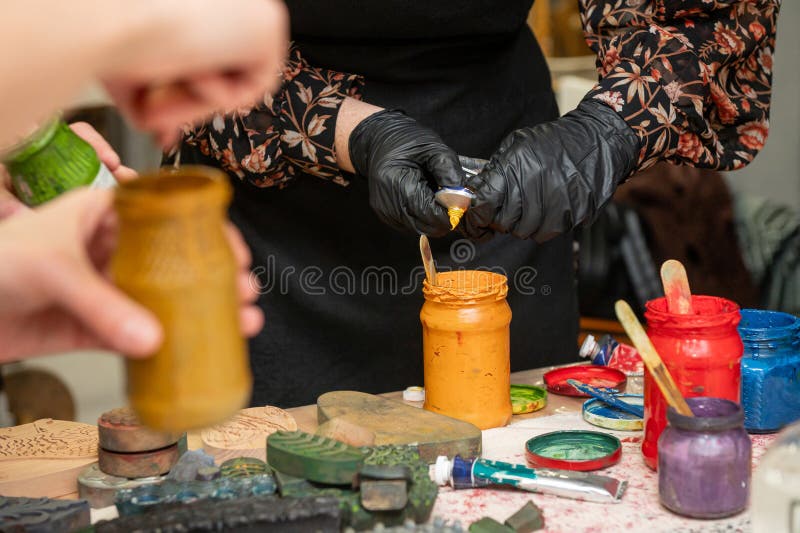 Artistic Workshop with Female Hands Creating Colorful Craft Prints ...