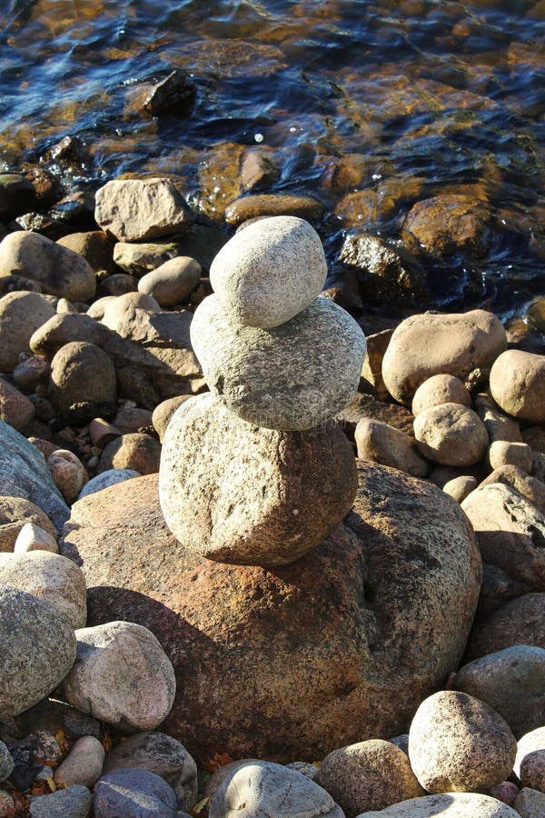 Artwork at the waters edge stock image. Image of shadows - 50851643