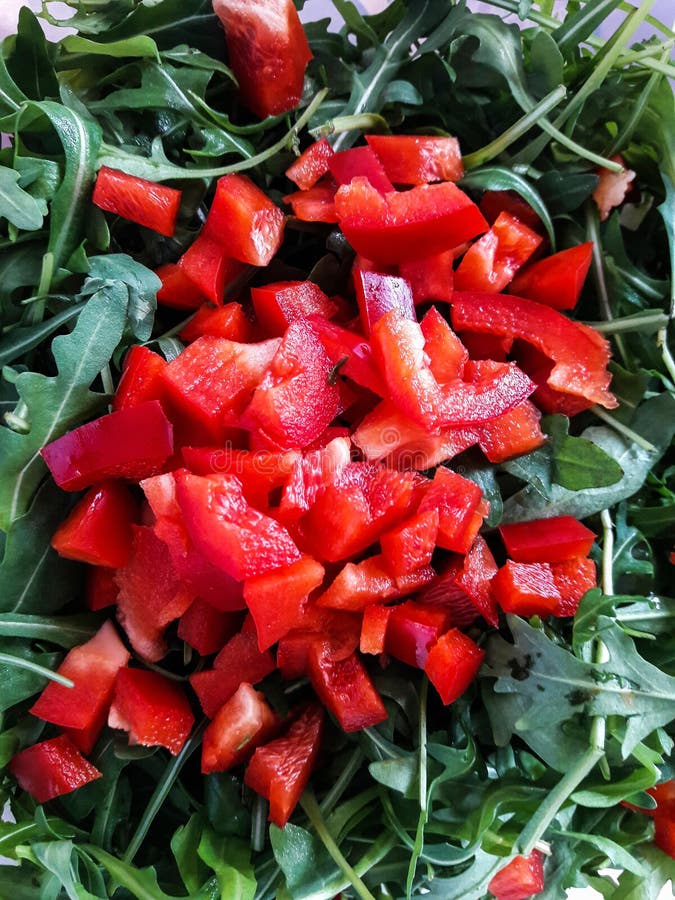Arugula and red capsicum stock photo. Image of ingredients - 181616624