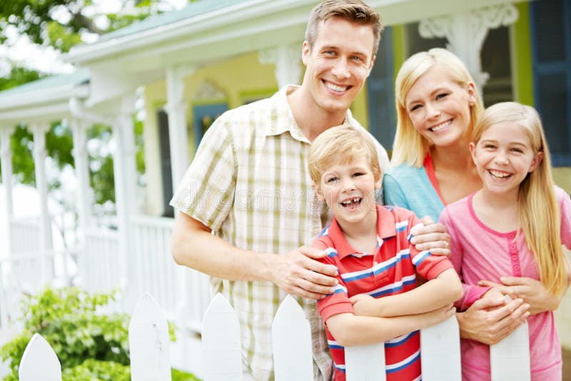 As Close As Family Can Be. a Young Family of Four Outside. Stock Image ...