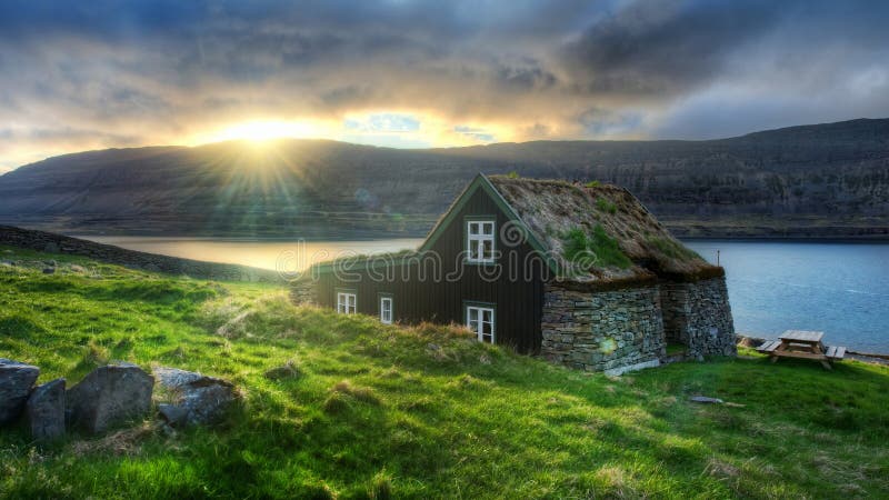 Sun Setting Behind the Building on the Field S Edge Stock Photo - Image ...