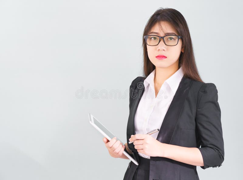 Asain Women in Suit Standing Using Her Digital Tablet Computer Stock ...
