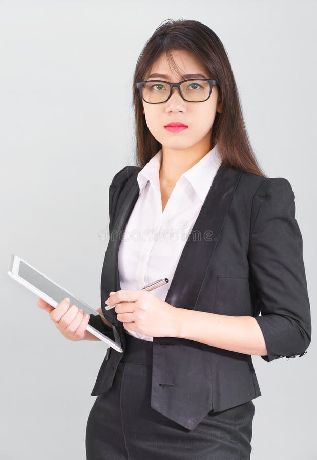 Asain Women in Suit Standing Using Her Digital Tablet Computer Stock ...