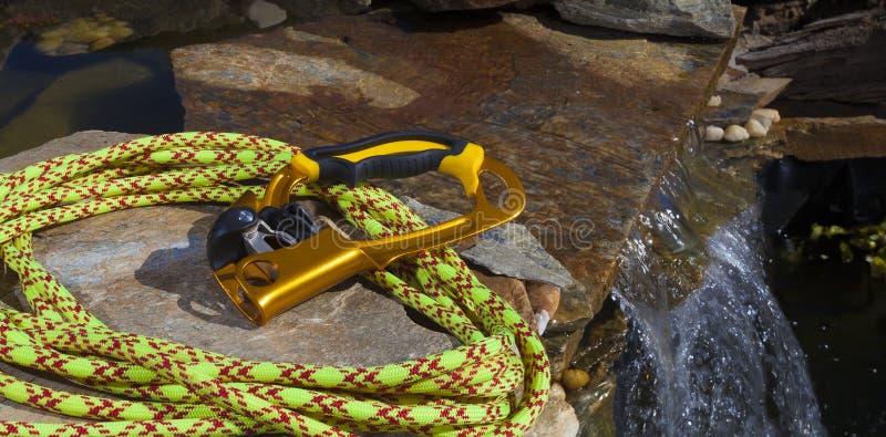 Ascender and Rope Near a Cascade Stock Image - Image of metal, nylon ...