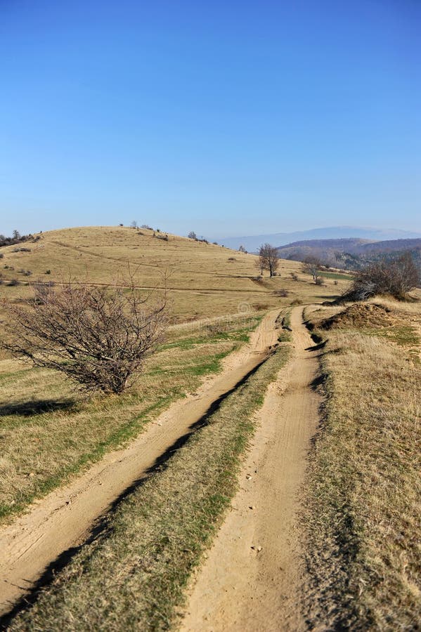 Ascending dirt road stock photo. Image of scarp, country - 17281826