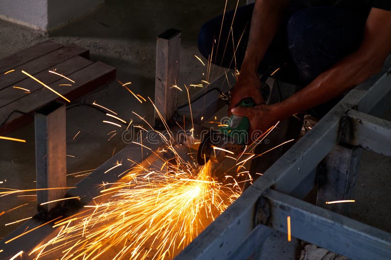 Unsafe Worker Cutting Metal Construction with No Protection Uniform ...