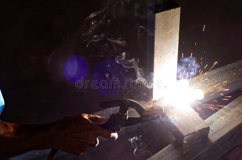 Unsafe Worker Cutting Metal Construction with No Protection Uniform ...