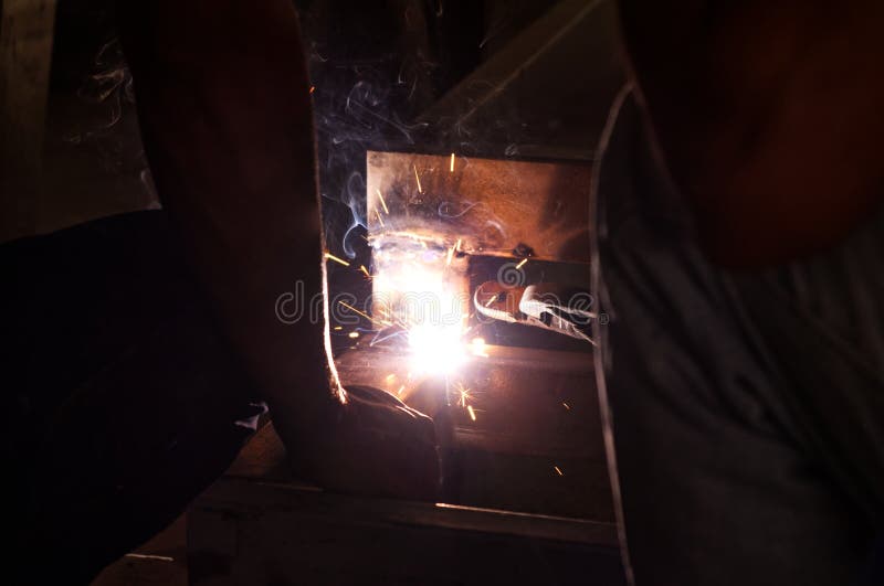Unsafe Welder Working with No Protection Uniform, Weld Metal with Arc ...