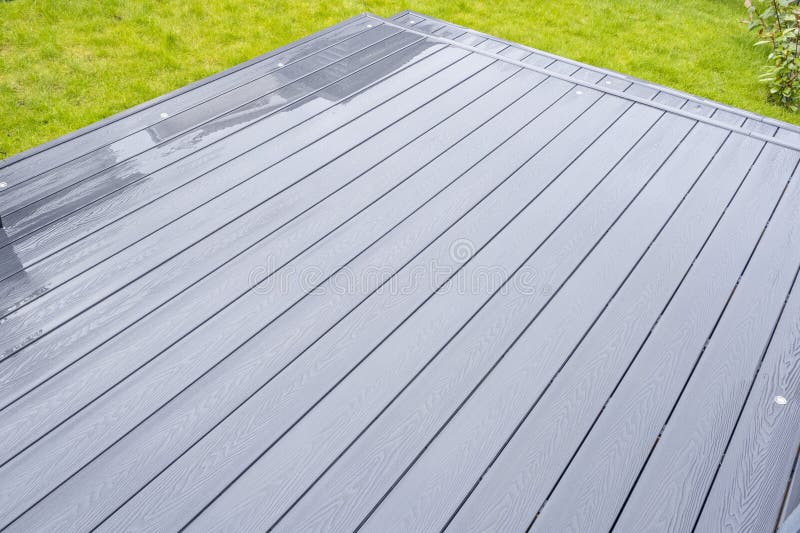 Ash Grey Composite Decking on a Rainy Wet Day Showing the Full Grain of ...