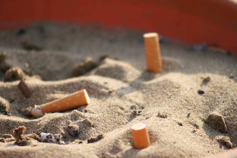 Ashtray in sand stock photo. Image of butts, sand, unhealthy - 3071102