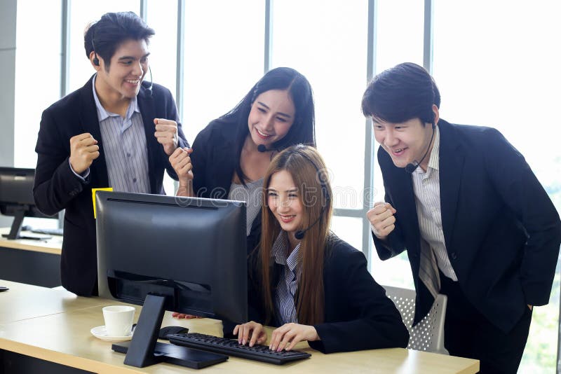 Asia Group of Call Center Workers or Confident Business Team with ...