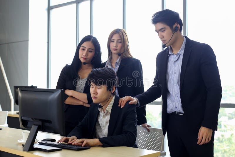 Asia Group of Call Center Workers or Confident Business Team with ...