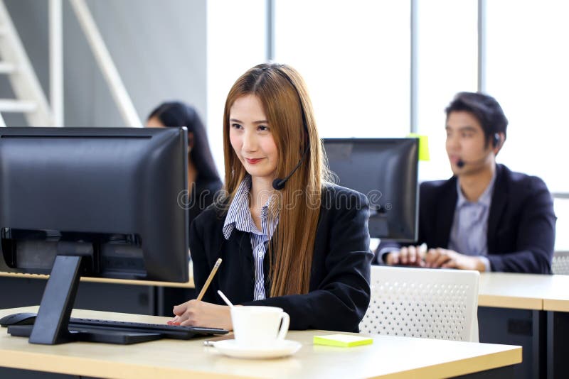Asia Group of Call Center Workers or Confident Business Team with ...