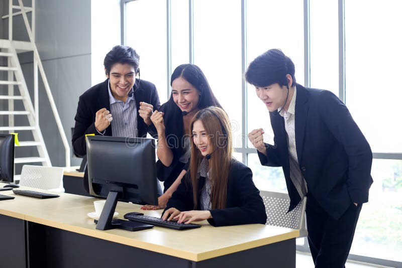 Asia Group of Call Center Workers or Confident Business Team with ...