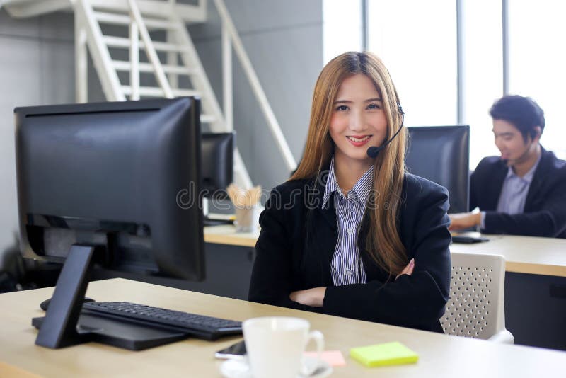 Asia Group of Call Center Workers or Confident Business Team with ...