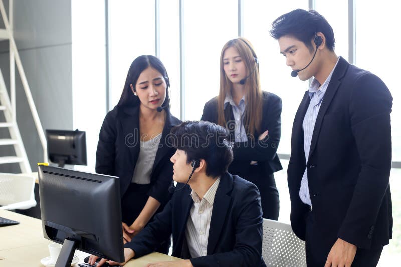 Asia Group of Call Center Workers or Confident Business Team with ...