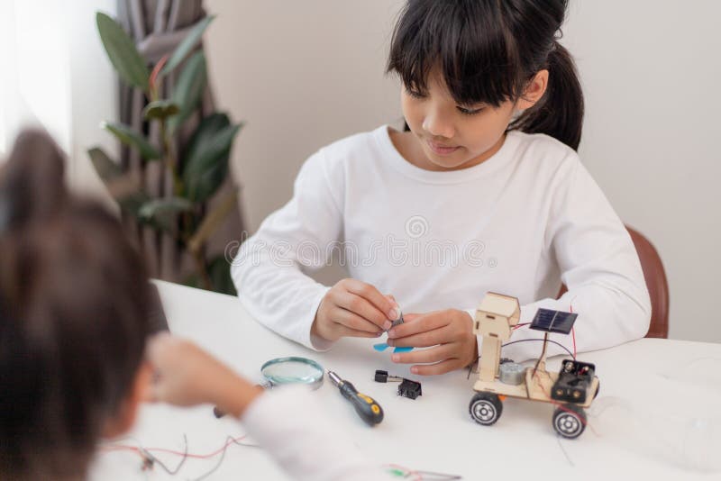 Asia Students Learn at Home in Coding Robot Cars and Electronic Board Cables in STEM, STEAM ...