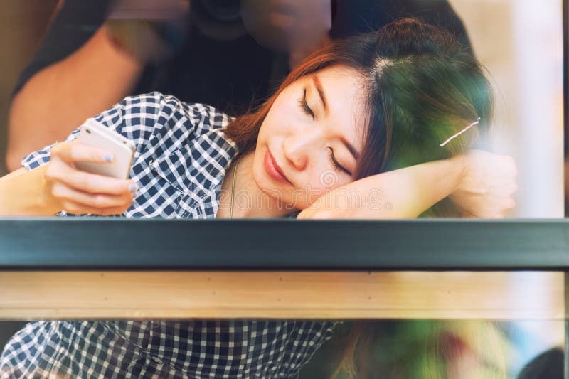 Asia Woman Sitting at Bar Table and Texting Her Mobile Stock Photo ...