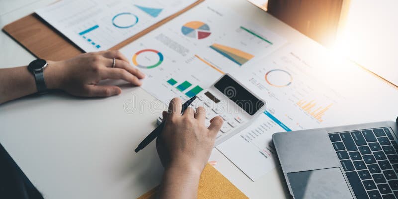 Asian Accountant Working and Analyzing Financial Reports Project ...