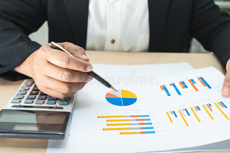 Asian Accountant Working and Analyzing Financial Reports Project ...