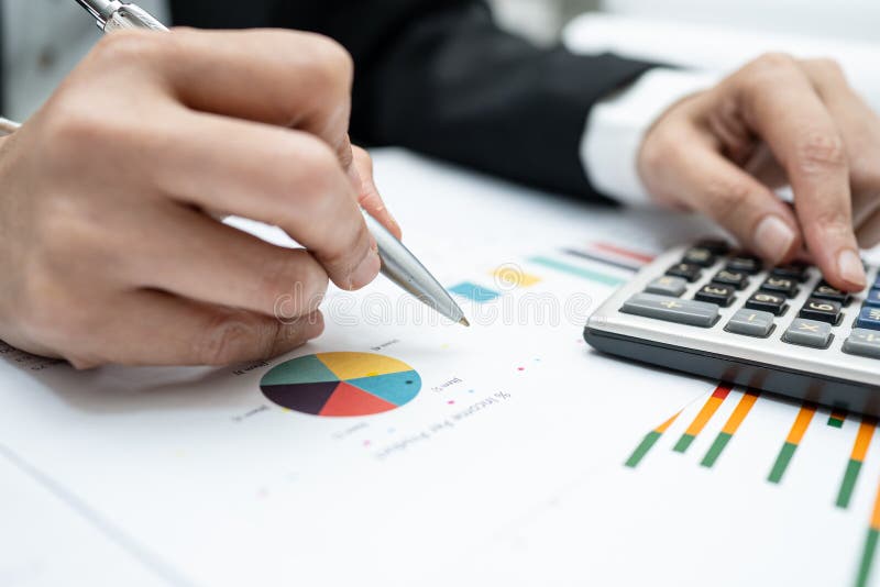 Asian Accountant Working and Analyzing Financial Reports Project ...