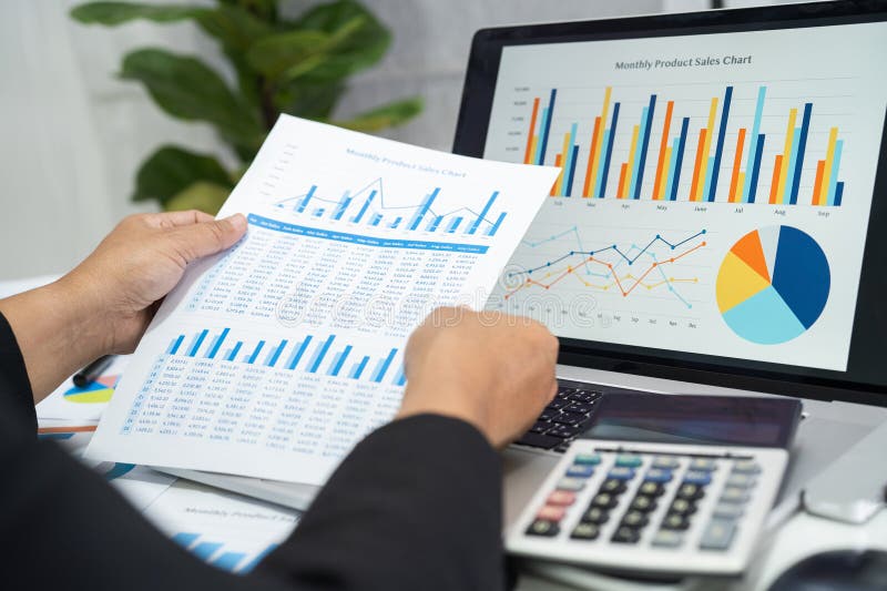 Asian Accountant Working and Analyzing Financial Reports Project ...