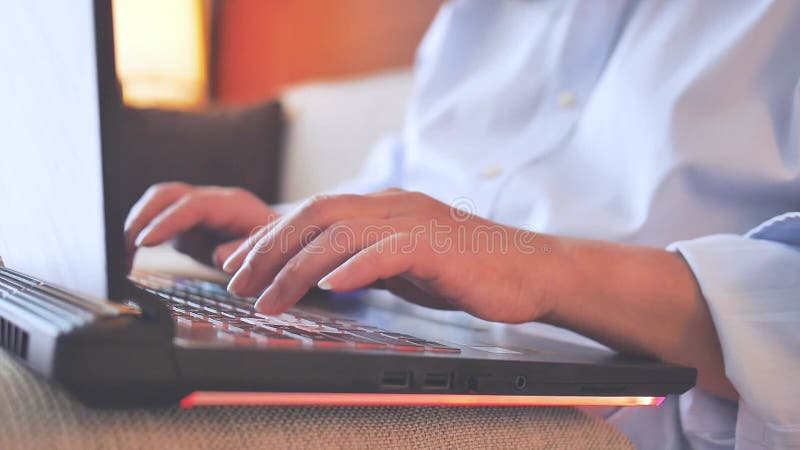 Asian Adult Hands Using Laptop Computer with Pillow Support Under ...