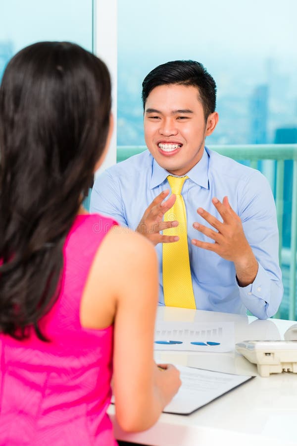 Asian Advisor with Client on Financial Investment Stock Photo - Image ...