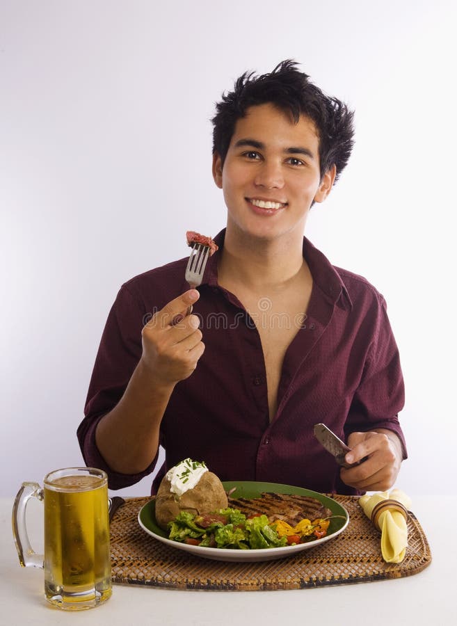 Asian American Man with Bite a Steak Stock Photo - Image of meal, snack ...