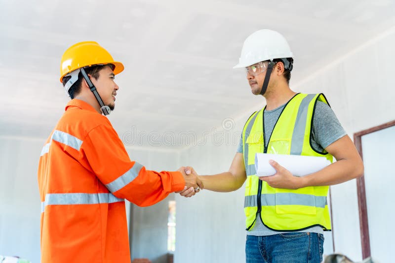 Asian Architect and Engineer Handshake with Foreman after Giving ...